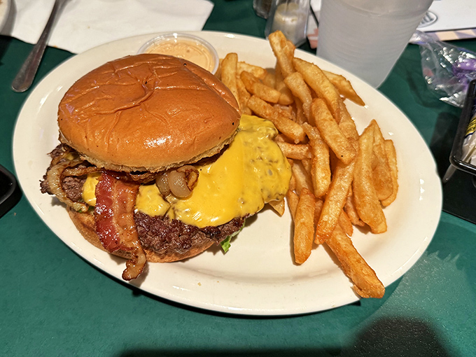 The burger arrives like a beautiful argument against pretentious food &ndash; simple, substantial, and sporting a cheese blanket that means business. 