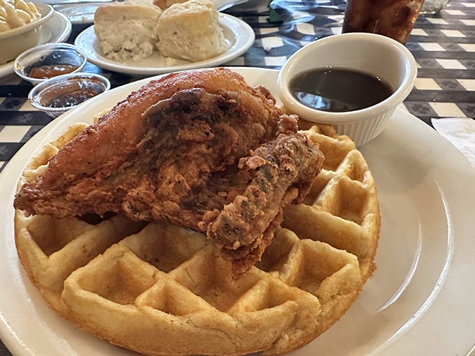 Whoever first decided to pair crispy fried chicken with fluffy waffles deserves a Nobel Prize in deliciousness. The maple syrup moat is non-negotiable. 