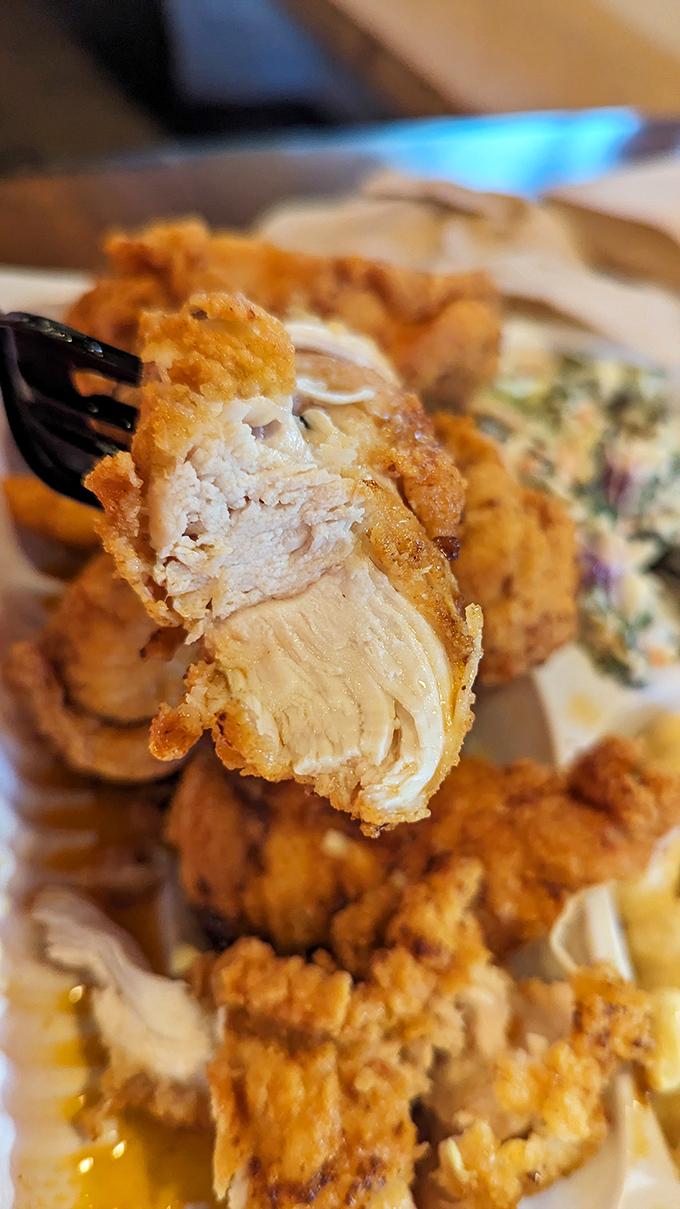 The cross-section reveals the truth &ndash; perfectly moist chicken beneath that audibly crunchy exterior. This is engineering at its most delicious.