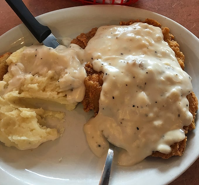 Chicken fried steak with mashed potatoes&mdash;the comfort food equivalent of a warm blanket on a cold Missouri evening. Gravy perfection.