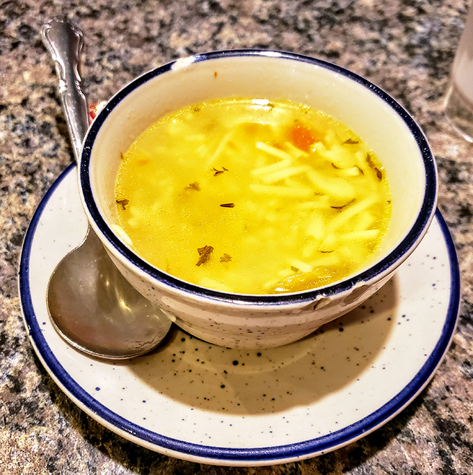 Chicken noodle soup that could make your grandmother nervous about her recipe. Golden broth that's clearly not from a can.