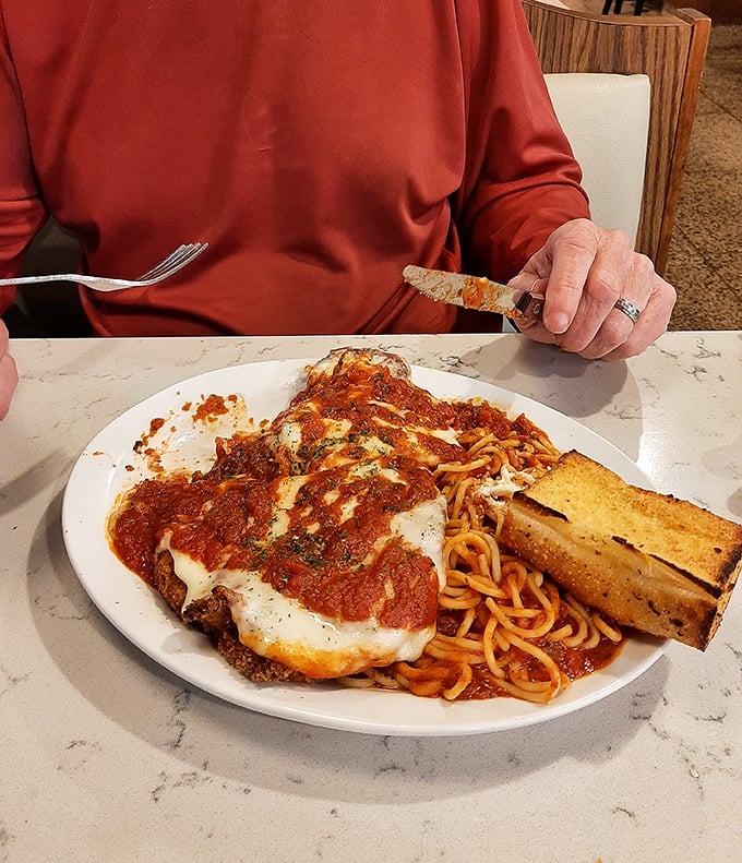 Chicken parmesan that doesn't just whisper "comfort food" &ndash; it belts it out like Pavarotti at his prime, complete with a perfect side of spaghetti.