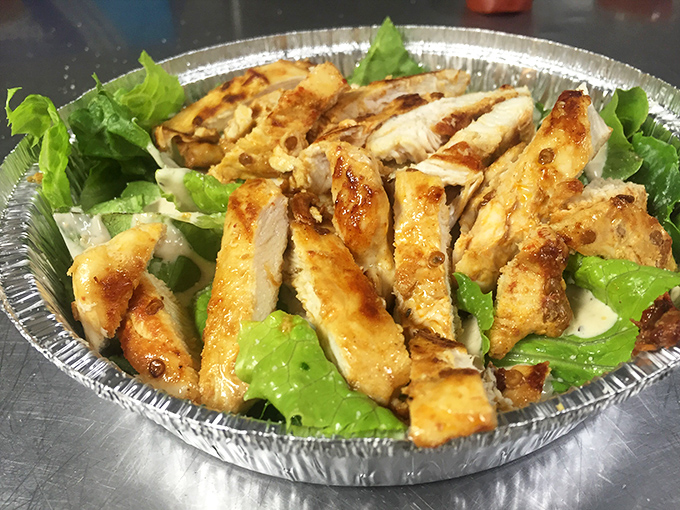A chicken salad that doesn't apologize for being healthy. Grilled protein and fresh greens playing together like old friends at a reunion.