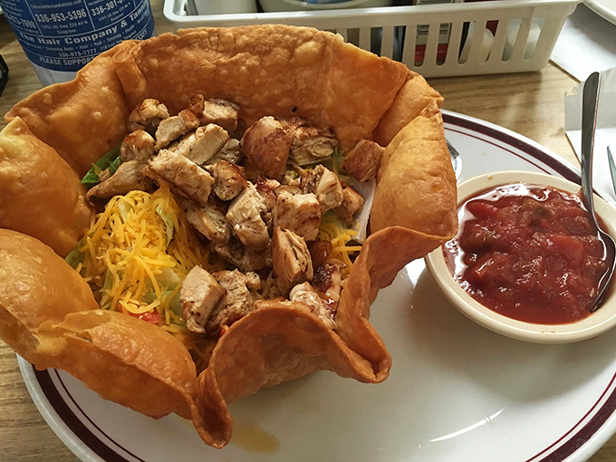 Not just a taco salad&mdash;a fortress of flavor. Crispy tortilla shell packed with protein and veggies, proving lunch at a breakfast joint is never an afterthought.