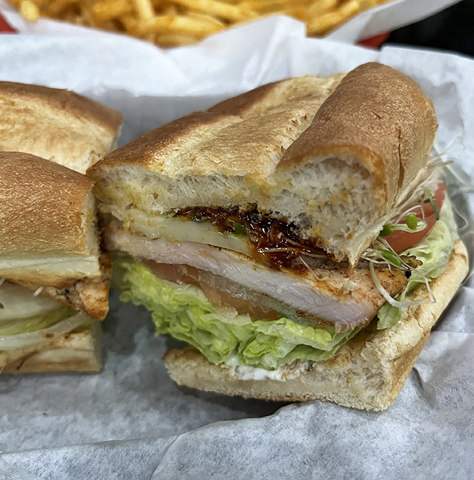 This golden-crusted chicken sandwich sits pretty on crusty bread, looking like comfort food's greatest overachiever in action.
