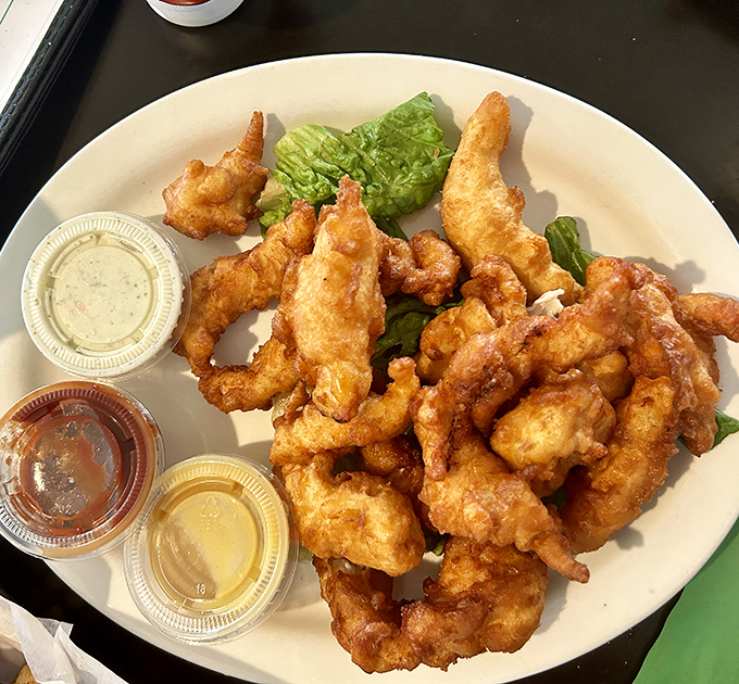 Crispy chicken tenders with a trio of dipping sauces&mdash;proof that sometimes the simplest pleasures deliver the most satisfaction.