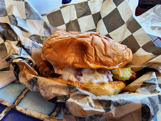 This chicken sandwich isn't just lunch&mdash;it's architecture, with layers of crunch, cool slaw, and creamy sauce creating the Taj Mahal of handheld meals.