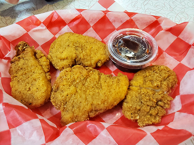 Chicken tenders that actually deserve the name&mdash;crispy armor protecting juicy meat that puts fast food imposters to shame. The dipping sauce is just a bonus.