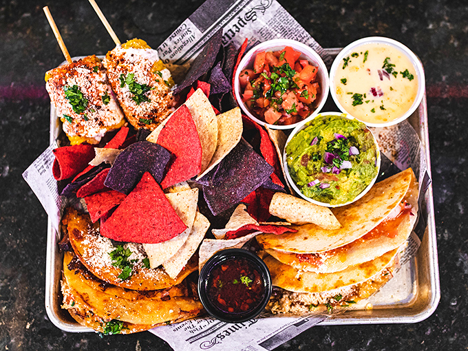 The sampler platter that solves all arguments. With street corn, chips, guacamole, and more, it's the United Nations of appetizers bringing peace to hungry tables.
