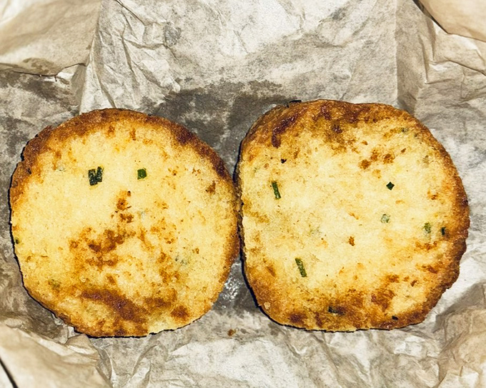 These chive biscuits aren't just baked, they're crafted&mdash;golden discs of comfort food that grandmothers everywhere would proudly claim as their own.