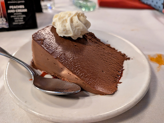 Chocolate mousse cake so velvety smooth it makes you wonder if clouds and chocolate had a delicious love child.