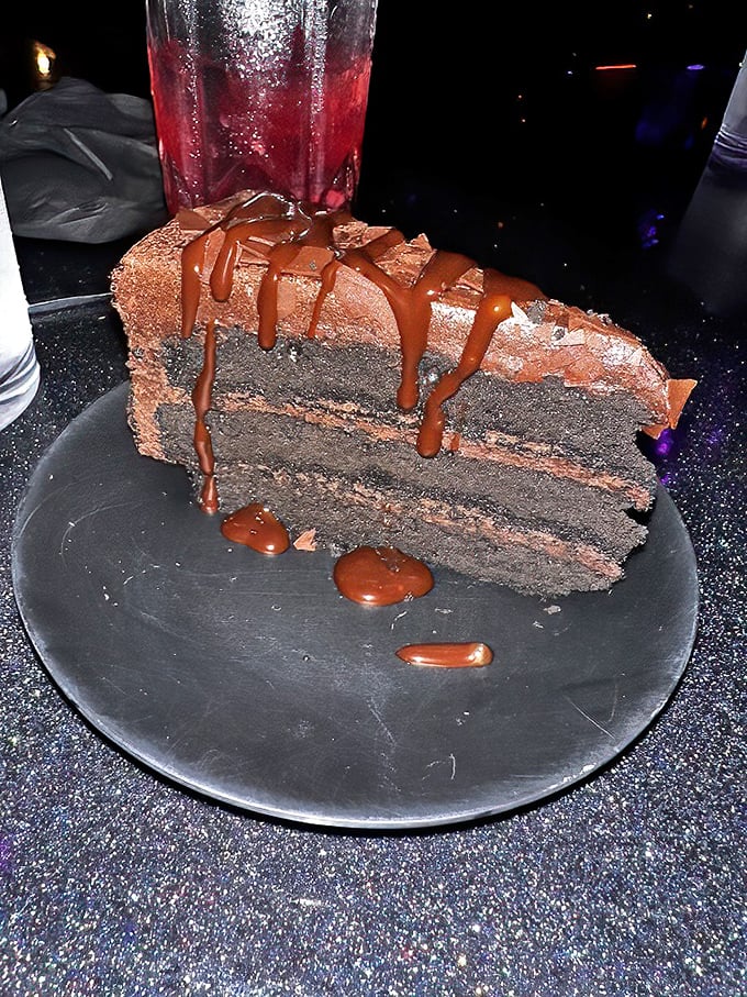 Chocolate cake so decadent it looks like it might have its own dark backstory. The dripping sauce adds perfect murder-mystery vibes.