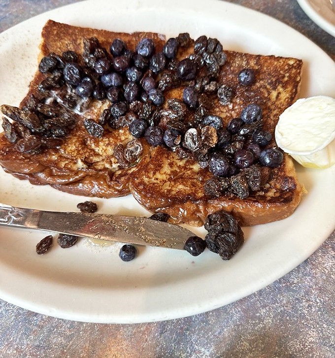 Blueberry French toast that makes you question every breakfast decision you've made until this moment. Life-changing? Possibly.