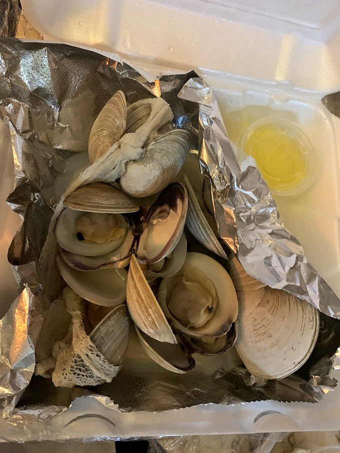 These clams aren't just fresh—they're having a party in foil and inviting butter to be their plus-one.