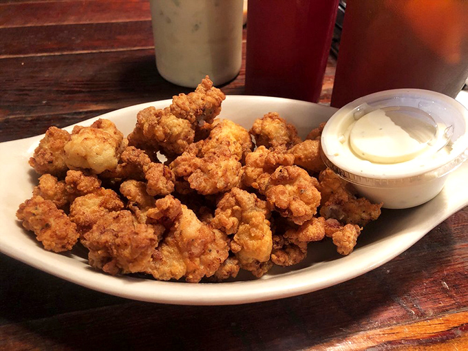 Popcorn-sized bites of fried goodness with dipping sauce standing by. This is what happens when the ocean meets a Southern fryer.