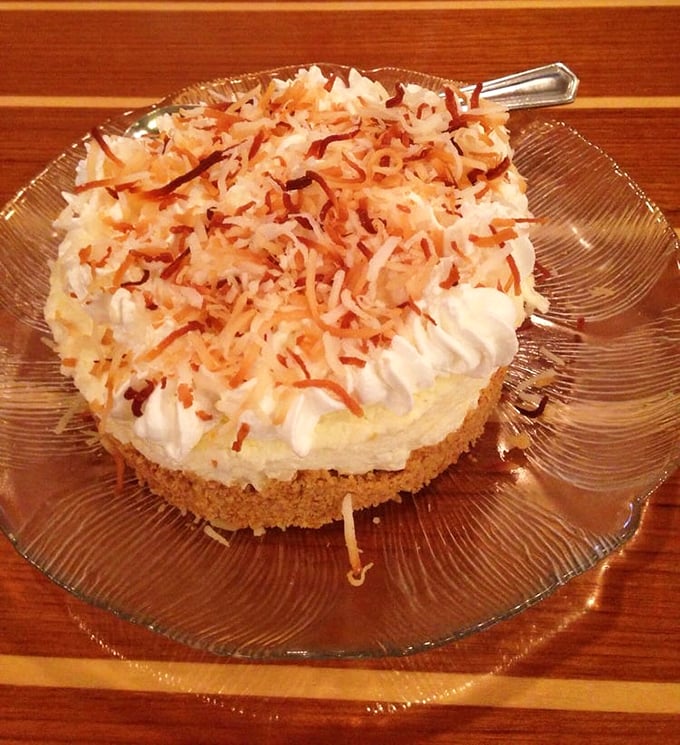 Coconut cream pie that deserves its own zip code. That toasted coconut crown turns dessert into an occasion.
