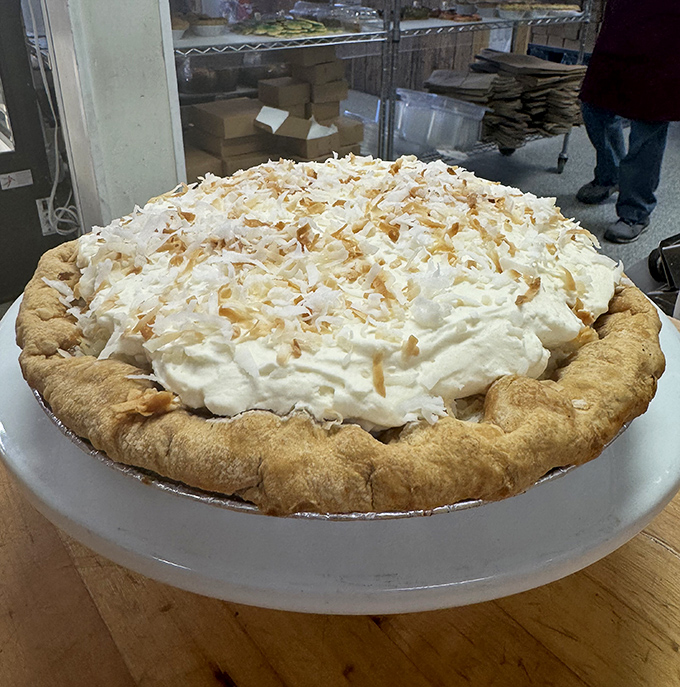 Not all heroes wear capes, but this coconut cream pie definitely deserves one—along with a trophy and possibly its own holiday.