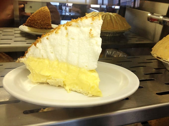 Coconut cream pie so light it might float away if not anchored by that perfect golden crust. Worth every delicious calorie.