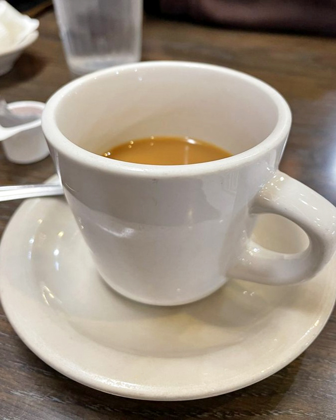 Simple pleasures: a classic white diner mug filled with steaming coffee. In a complicated world, this might be the most honest relationship you'll ever have.