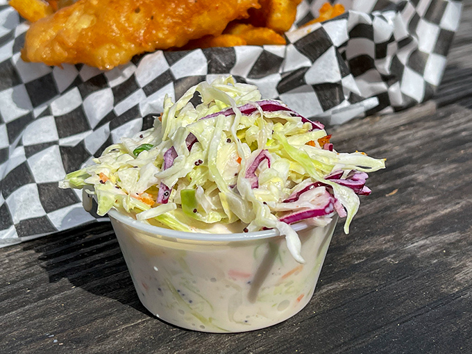 The coleslaw that launched a thousand return trips&mdash;crisp, creamy, and somehow managing to upstage the seafood it accompanies.