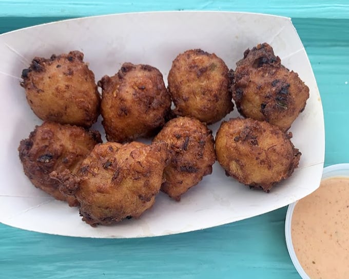 These conch fritters look like little golden planets of flavor, ready to transport your taste buds to the Caribbean with one crunchy bite. 