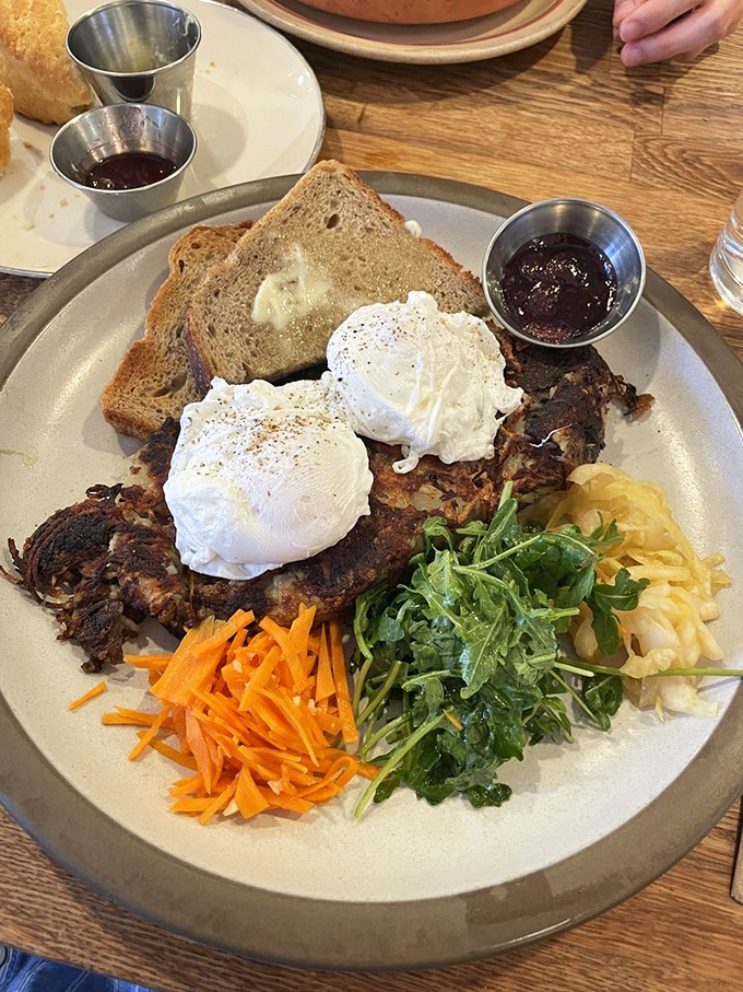 Golden corned beef hash topped with poached eggs proves that some classics never go out of style or taste.