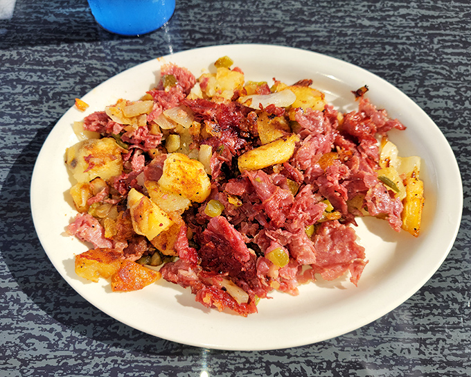 Corned beef hash that doesn't come from a can&mdash;a beautiful marriage of crispy potatoes and savory meat that would make your cardiologist wince.