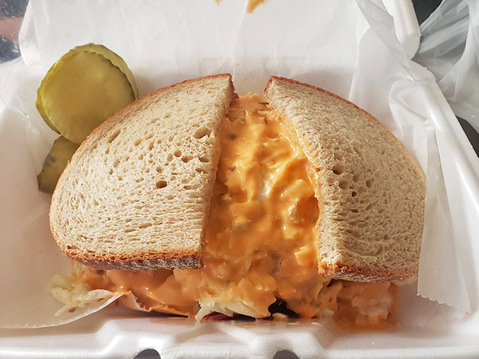 This sesame-seeded beauty boasts a garden of shredded lettuce atop layers of meat and cheese&mdash;proof that sometimes more is exactly right.