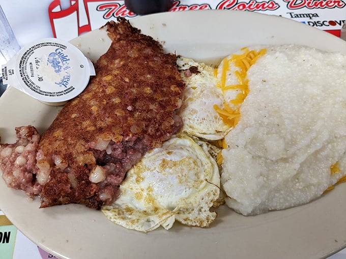 Corned beef hash with eggs and grits &ndash; the breakfast trinity that's converted more night owls into morning people than all the alarm clocks in Florida.