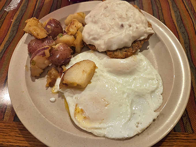 Country fried steak smothered in gravy with a side of home fries and eggs &ndash; the kind of breakfast that fueled America's greatest generation.