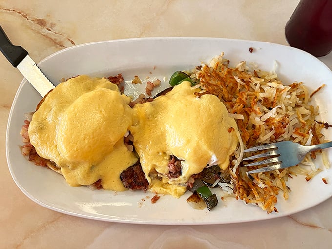 Country Benedict: where hollandaise dreams come true. Those crispy potatoes aren't just sharing the plate&mdash;they're fighting for the spotlight.