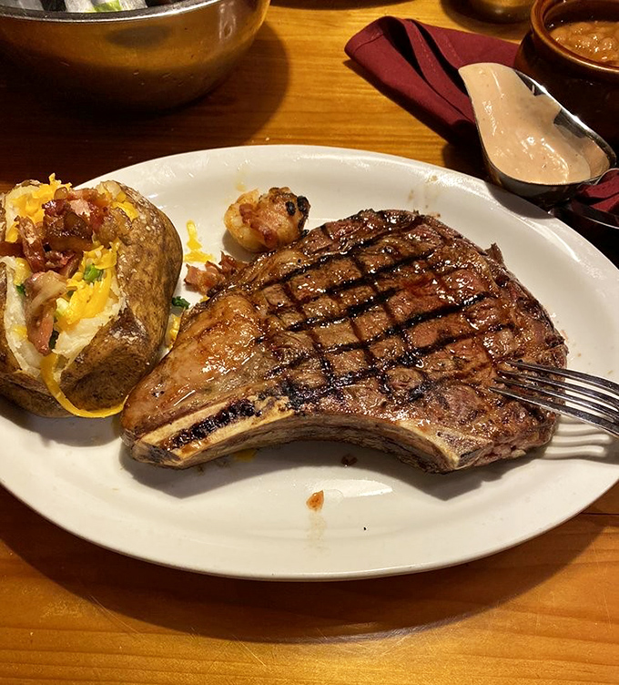 The T-bone steak and loaded potato&mdash;a pairing as classic as Sinatra and bourbon, but with better grill marks.