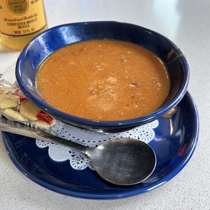 A bowl of crab bisque that's basically a warm hug in liquid form. The kind of soup that makes you forgive Florida's occasional hurricane.