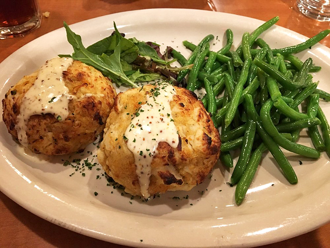 Crab cakes that deserve their own area code, with a cream sauce that would make Neptune himself swim upstream for seconds.