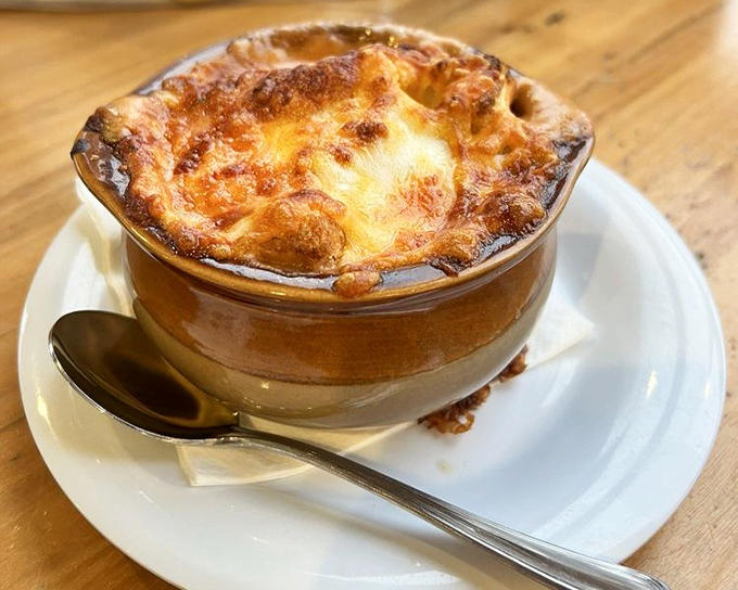 This French onion soup's seafaring cousin comes topped with a crown of melted cheese that would make any landlubber reconsider their life choices.