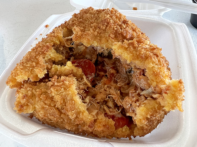 Crack through the crispy exterior of this deviled crab and you'll understand why Tampanians have been making pilgrimages here for generations.