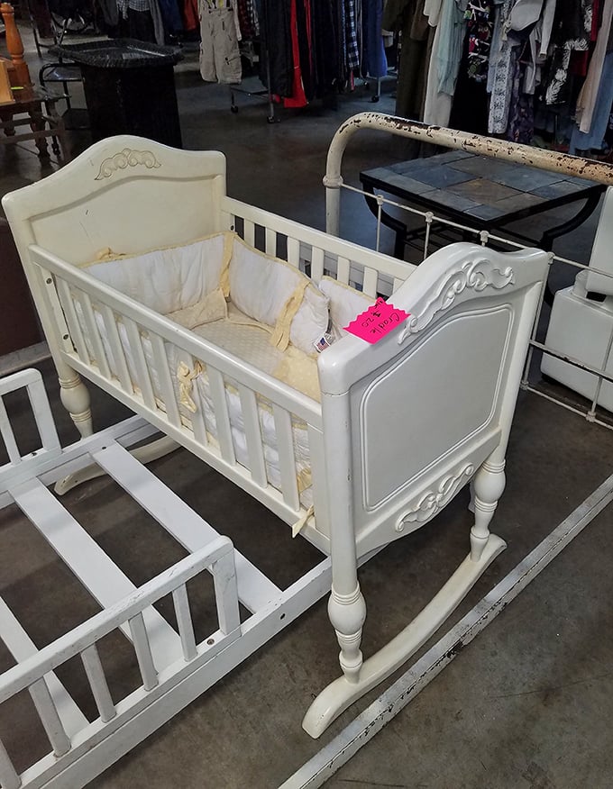 A gently-loved baby cradle waits for its next starring role. Nursery furniture that whispers stories of midnight lullabies while saving parents a fortune.