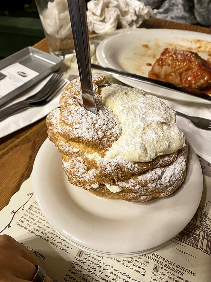 The legendary cream puff in all its powdered-sugar glory&mdash;a pastry so impressive it deserves its own Ohio state holiday.