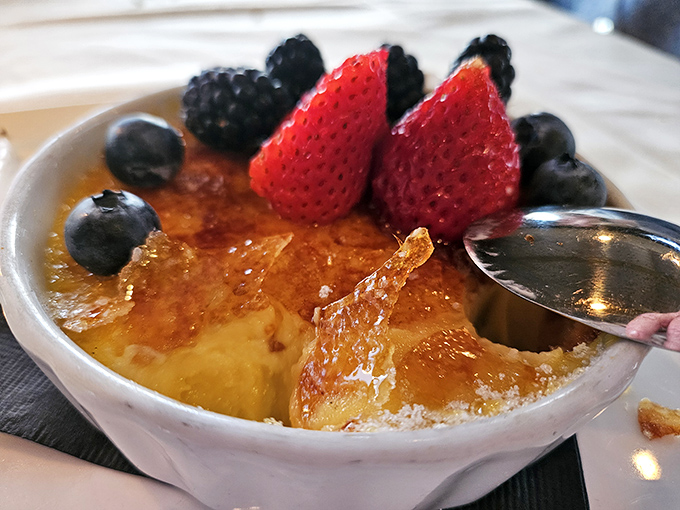 Crack through this cr&egrave;me br&ucirc;l&eacute;e's glassy caramelized top and you'll find custard so silky it could moonlight as a luxury bedsheet.