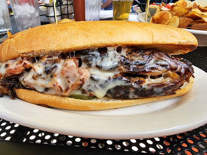 This Cuban sandwich isn't messing around – melted cheese cascading over layers of meat, pressed between bread that's achieved that perfect crispy-yet-soft balance.