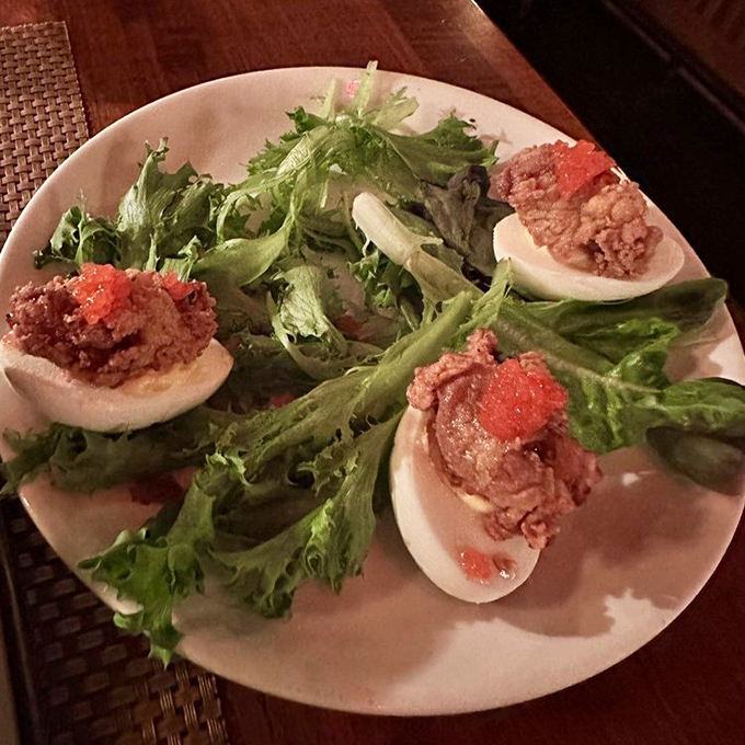 Deviled eggs that have clearly made a deal with culinary heaven. That pop of color isn't just for show&mdash;it's flavor you can see.