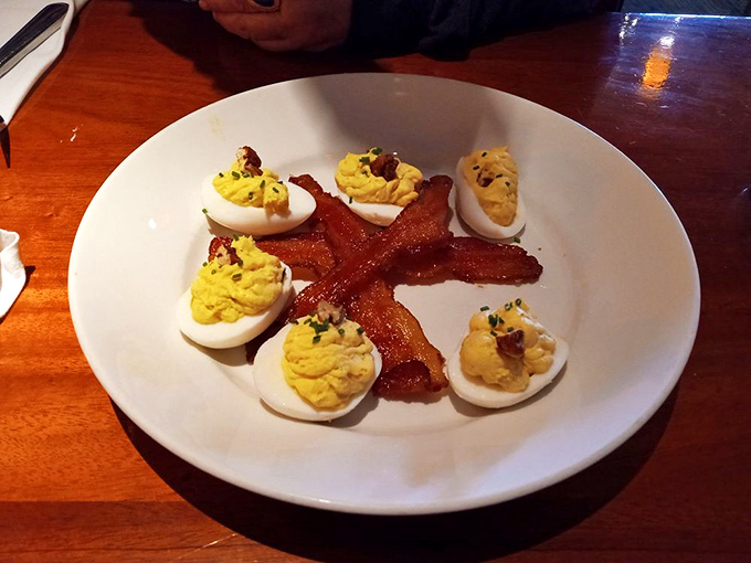 Deviled eggs arranged like a delicious flower, with bacon as the centerpiece &ndash; breakfast's greatest hits remixed for dinner.