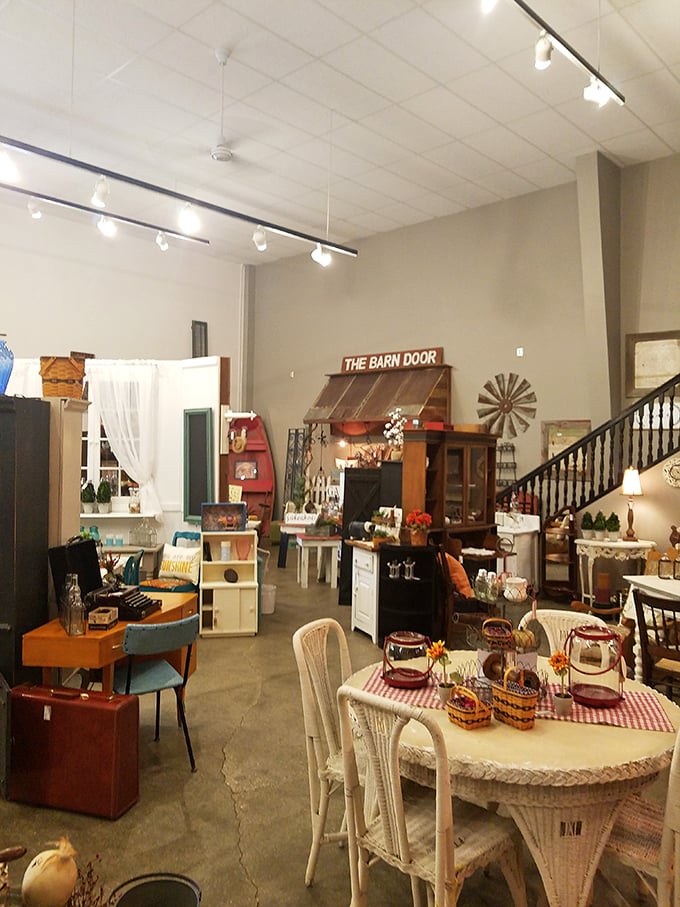 Botanical pillows and rustic textures—the kind of farmhouse elegance that makes you want to host dinner parties you've been avoiding.