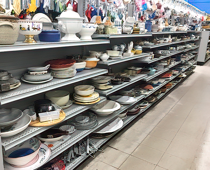 Vintage Pyrex patterns neighbor everyday plates in this dishware wonderland. Your grandmother's china cabinet called&mdash;it wants you to bring home some new friends.