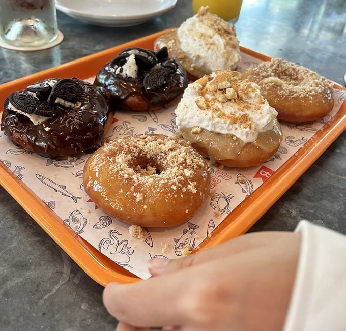 Donut brunch in the downstairs "Den" transforms breakfast into an event. These aren't your average morning carbs&mdash;they're little rings of joy.