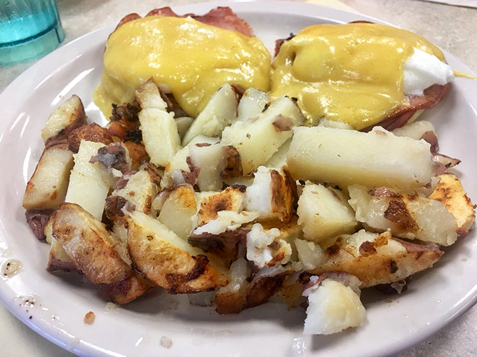 Eggs Benedict done right&mdash;where hollandaise sauce doesn't come from a packet and potatoes are given the respect they deserve.