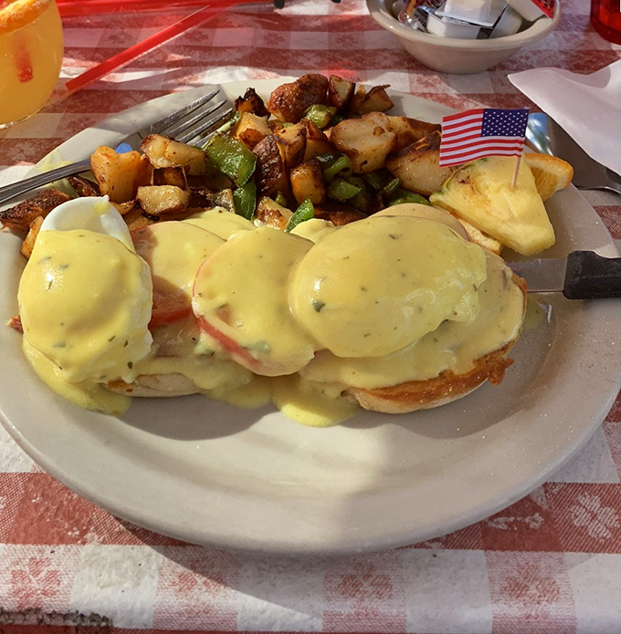 Eggs Benedict that would make the Pope convert to breakfast worship, with hollandaise sauce cascading like a yellow waterfall.