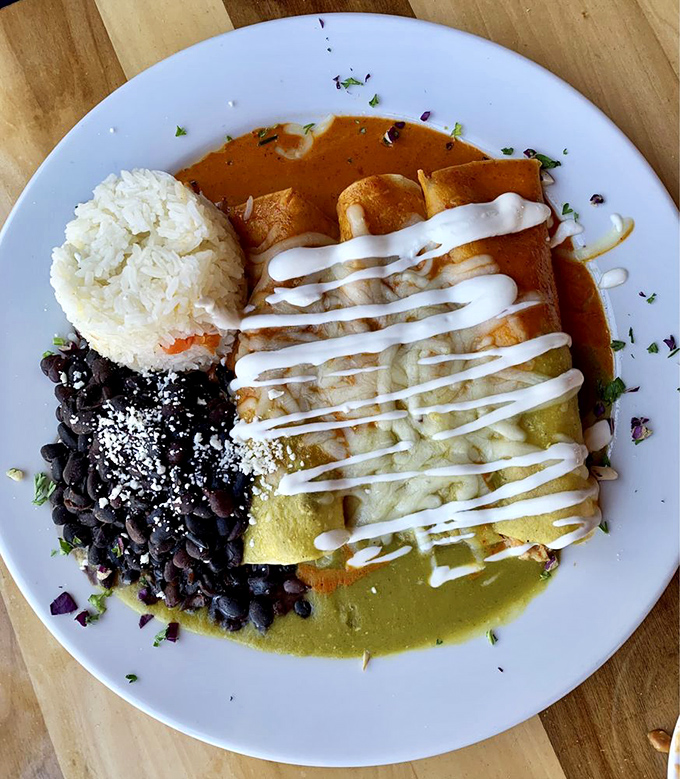 This isn't just an enchilada &ndash; it's a flavor blanket tucked around a perfect filling, then dressed in two complementary sauces like a culinary yin and yang.