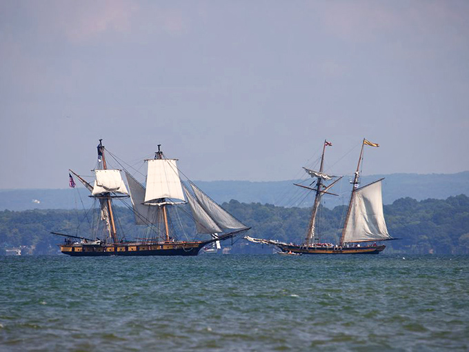 Tall ships transform the horizon into a living history lesson, bringing maritime romance to modern times.