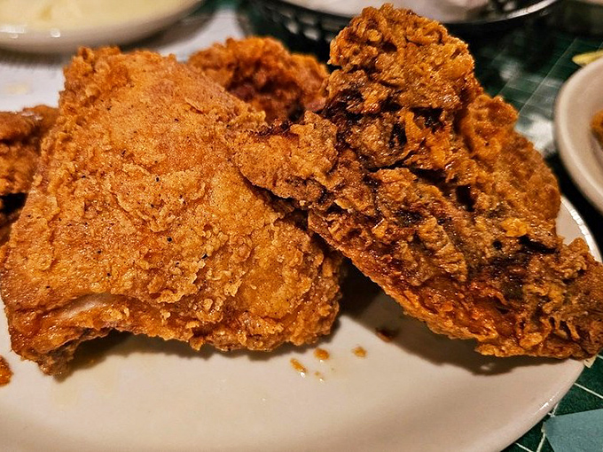 Fried chicken so perfectly executed it should have its own Instagram account. That crackling crust is the soundtrack to happiness in food form.